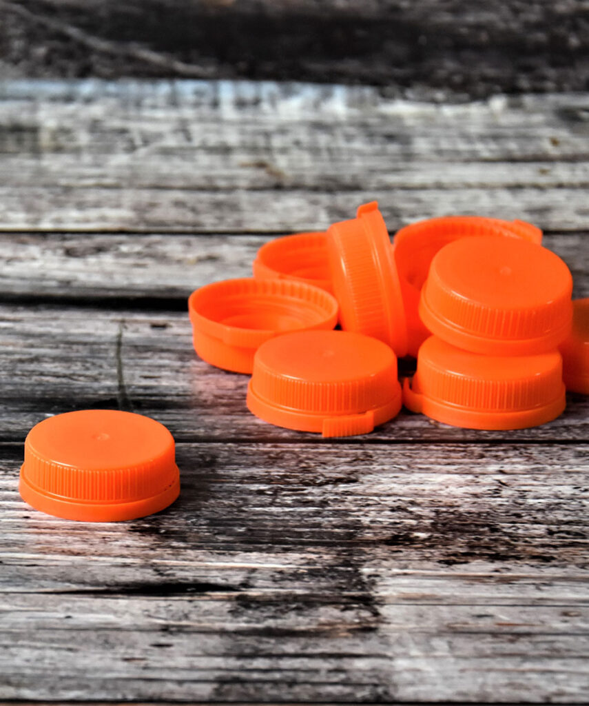 Juicing Packaging - Orange caps for juice bottles